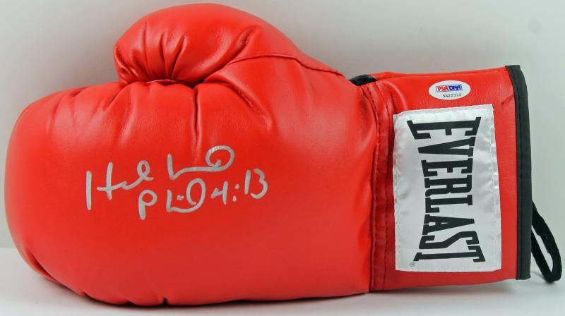 Evander Holyfield Cards and Autographed Memorabilia Buying Guide